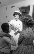 Florida Memory • Doris Mathis demonstrating oral hygiene to children in ...