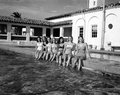 Florida Memory • Swimmers sit next to the pool - Fort Lauderdale, Florida