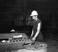 Florida Memory • A worker bending steel bars into shape at the Laclede ...