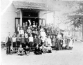 Florida Memory • Teachers and children posed in front of a wooden ...